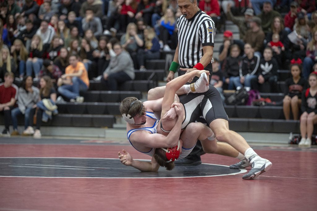 Waynesburg tops Trinity, 50-24, to remain unbeaten - Herald-Standard